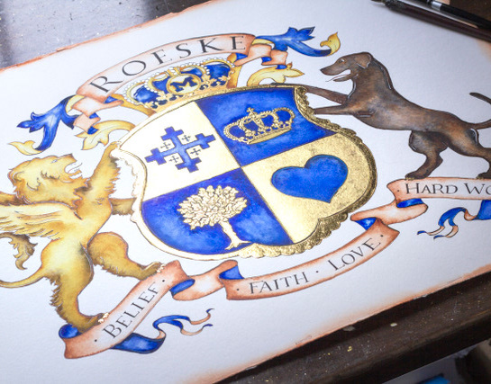 Hand painted family crests by Jamie Hansen